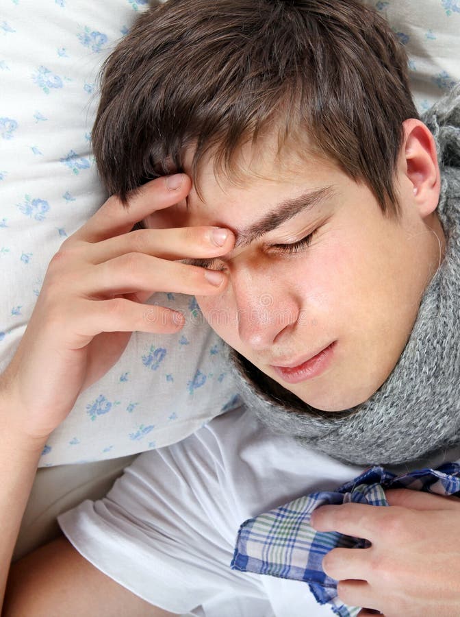 Sick Young Man stock photo. Image of illness, alone, pillow - 69479796