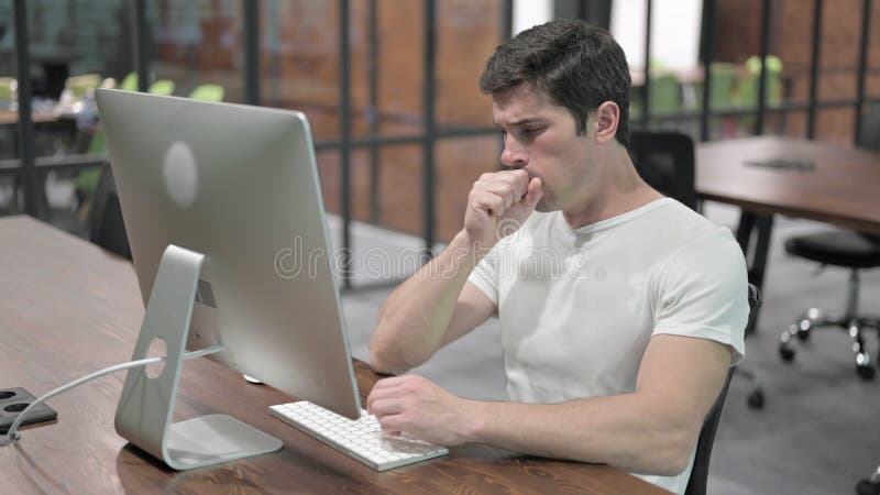 Sick Young Man Coughing while Working on Computer Stock Image - Image ...
