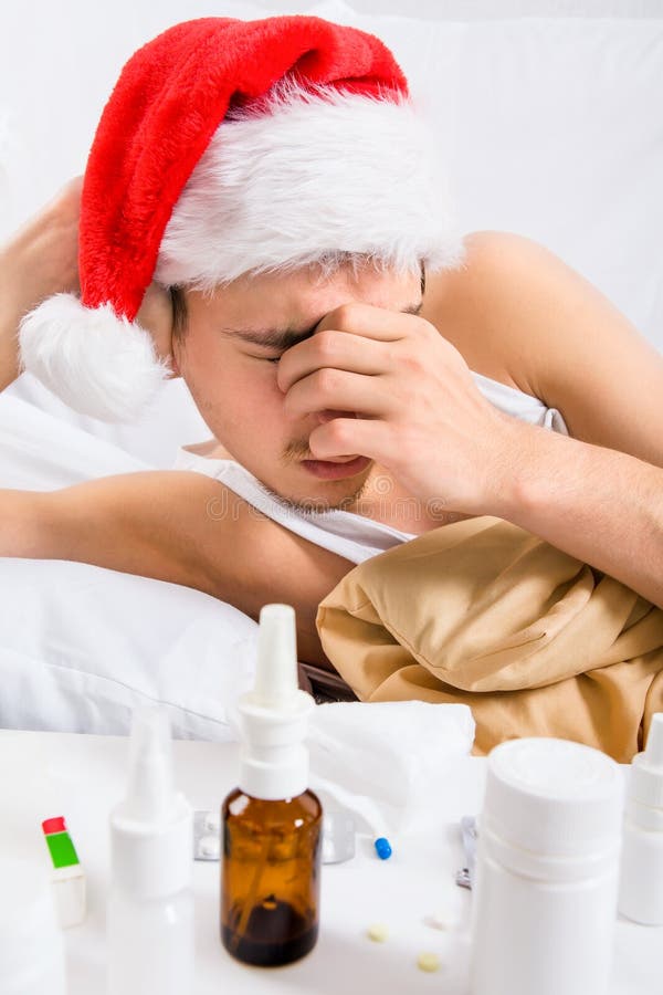 Sick Young Man in Santa Hat Stock Image - Image of cure, male: 162313283