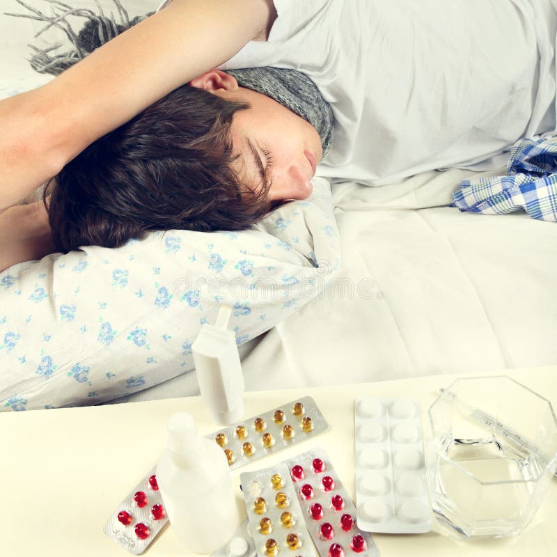 Sick Young Man sleeping stock image. Image of illness - 54545081