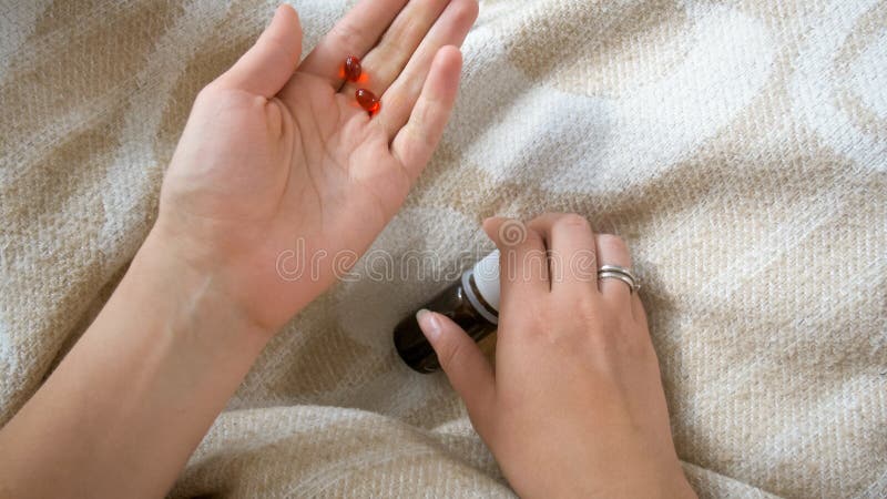 Sick Young Woman Holding Red Pills or Tablets on Hand Stock Image ...