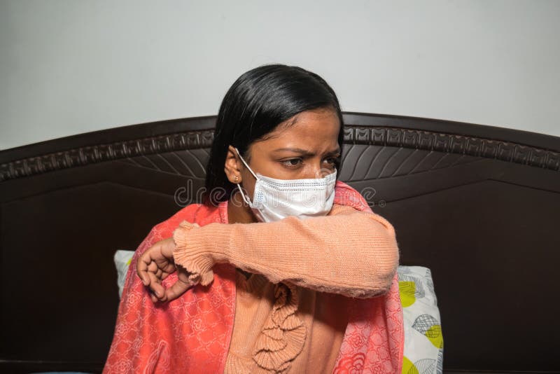 A Sick Young Woman Latin with Face Mask and Flu Stock Photo - Image of ...