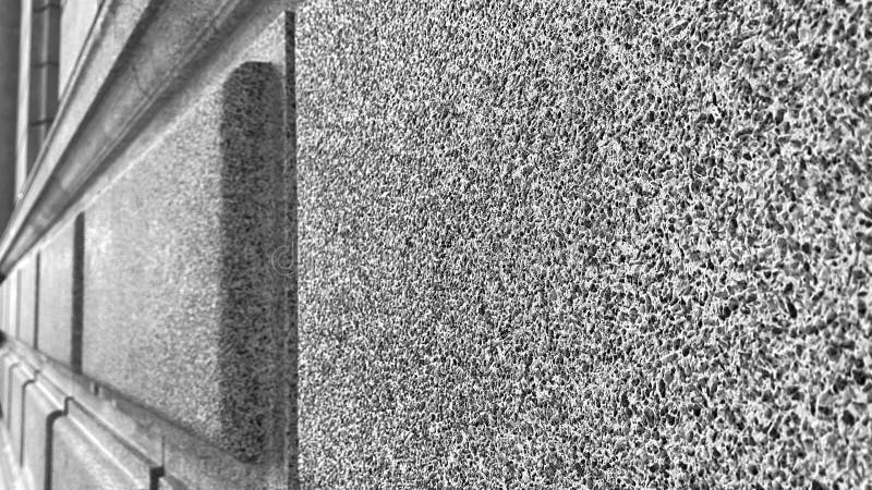 Side Angle Serenity View of Striking Brick Stone Wall Pattern with Grey ...