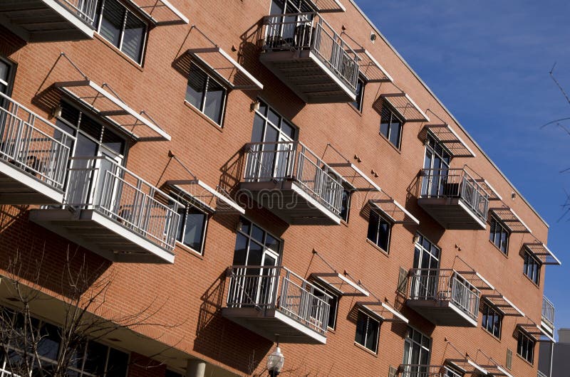 Side of Apartment Building in an Urban Area Stock Image - Image of ...