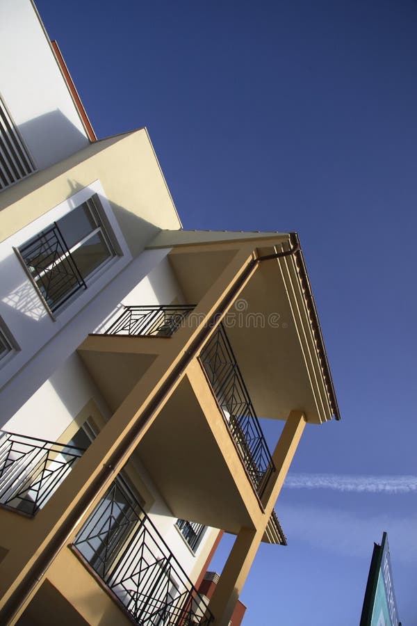Side of Building with Balcony Stock Image - Image of patio, story: 2272739