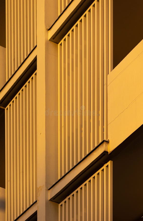 The Side of a Building with Multiple Balconies and No Top Windows Stock ...