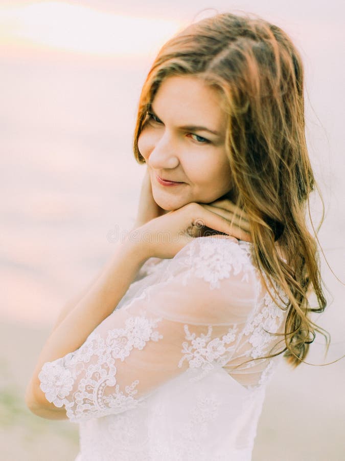 Close-up Down View of the Beautiful Newlywed Couple Laying on the Dress ...