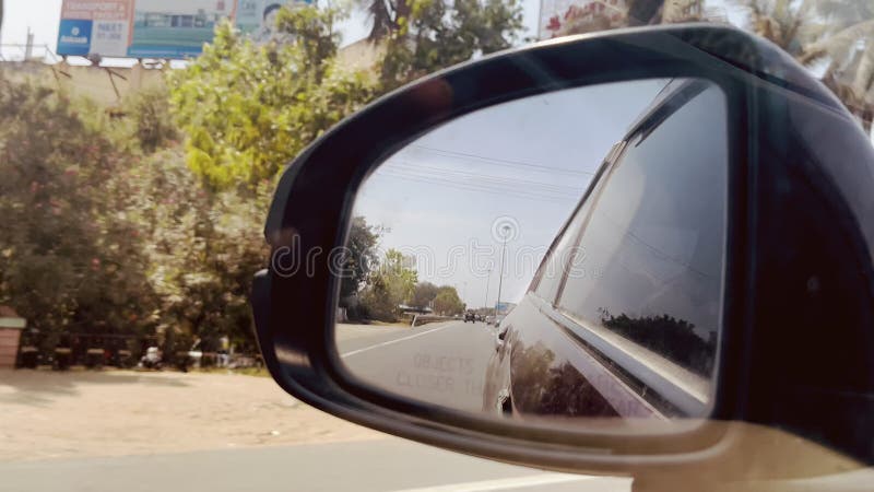 Side Concave Mirror and a Normal View of Roadways from a Moving Car ...