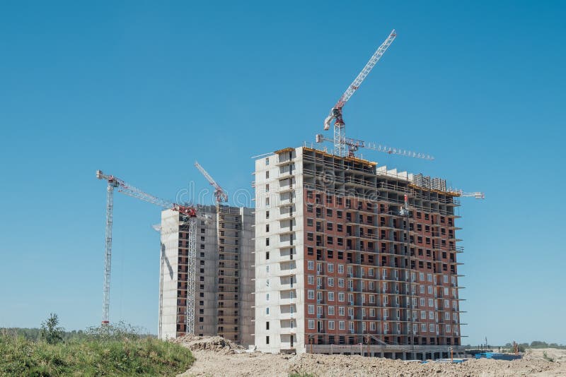 Side with Cranes Against Blue Sky Stock Image - Image of hoist, modern ...