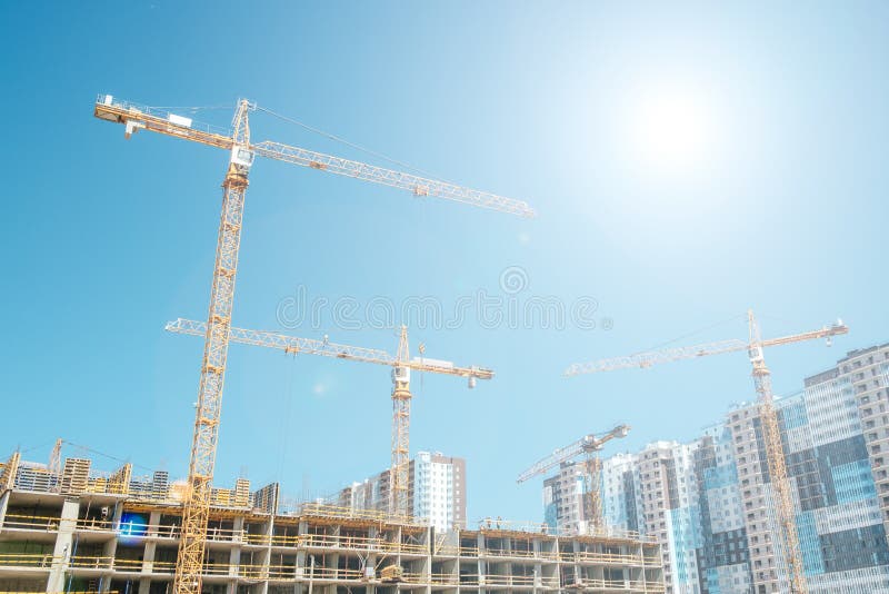 Side with Cranes Against Blue Sky Stock Image - Image of engineering ...