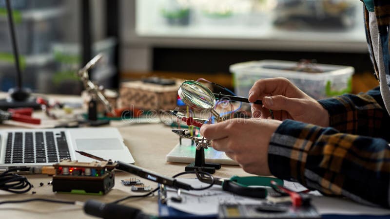Side of Cropped Male Engineer Soldering Microchip Stock Image - Image ...
