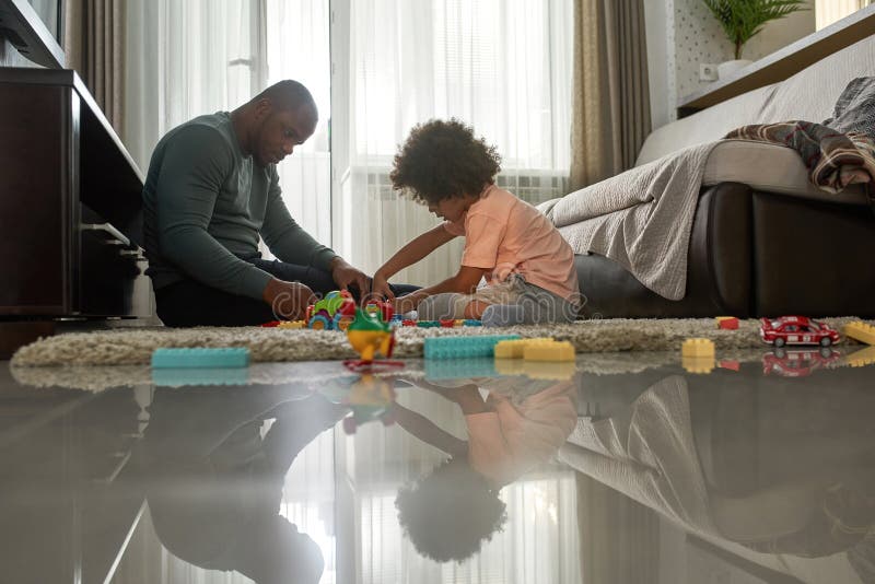 Side of Dad and Son Play with Construction Blocks Stock Photo - Image ...