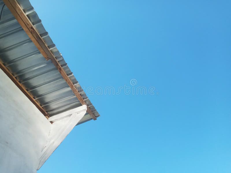 Side of a House Building with Clear Blue Sky Backgroung Stock Image ...