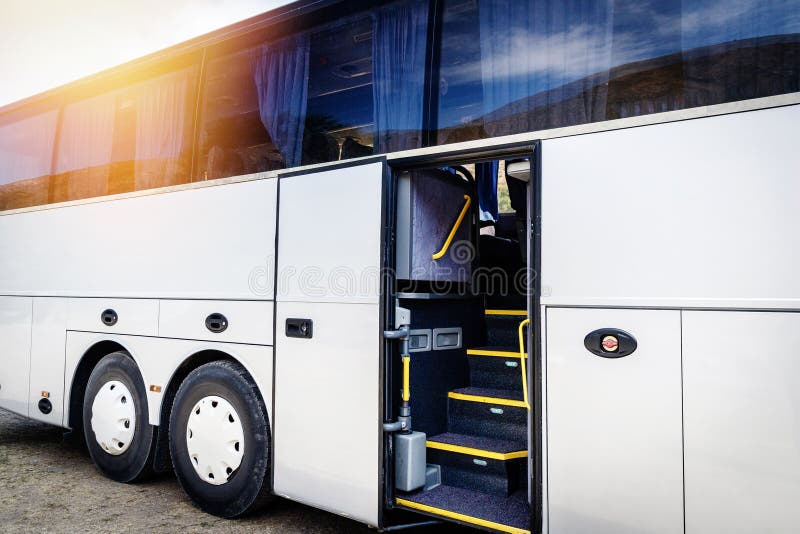 Side of a Large White Tourist Bus with an Open Door Stock Image - Image ...