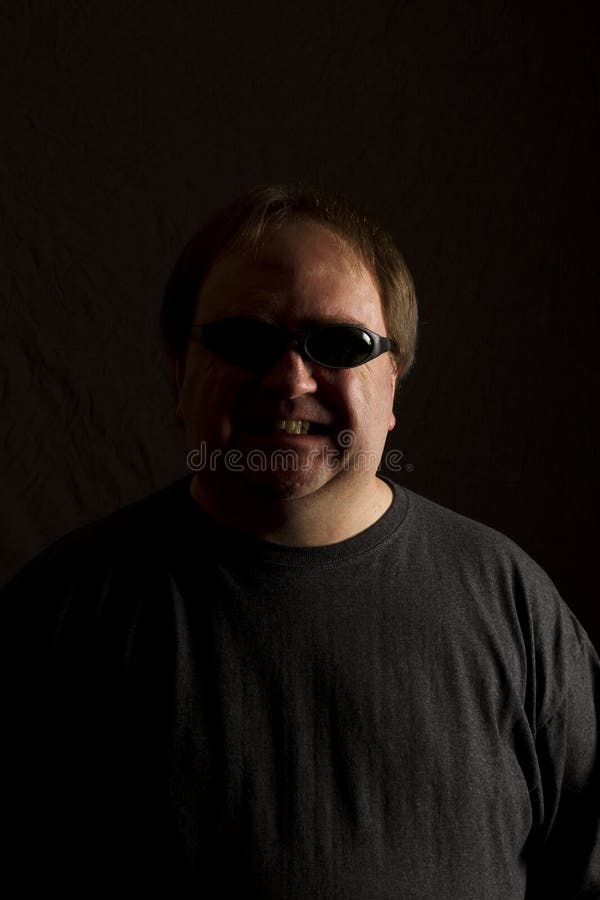Side-lit Man Sunglasses stock photo. Image of concept - 19463266