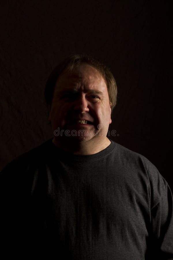 Side-lit Man Upset stock photo. Image of dark, portrait - 19463364