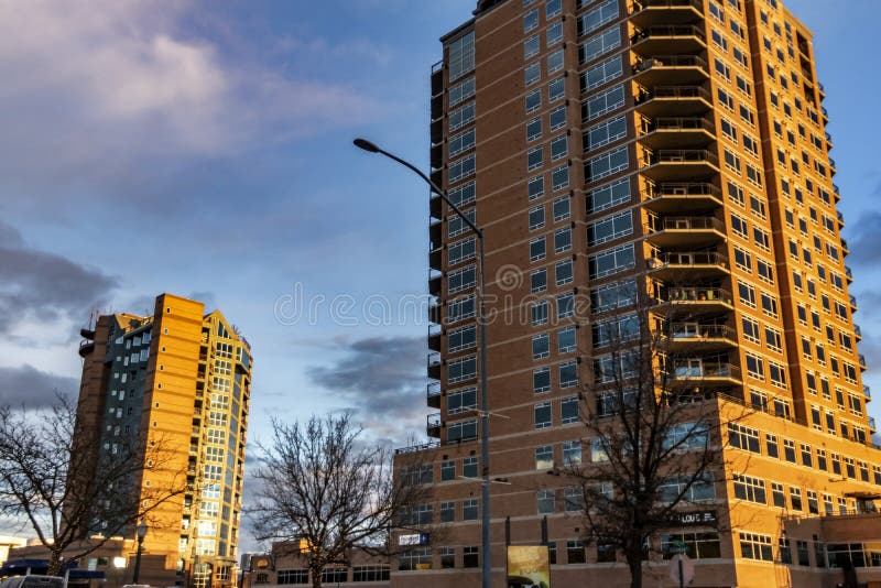 Side Lit Tall Red Brick High Rise Building Stock Photo - Image of rooms ...