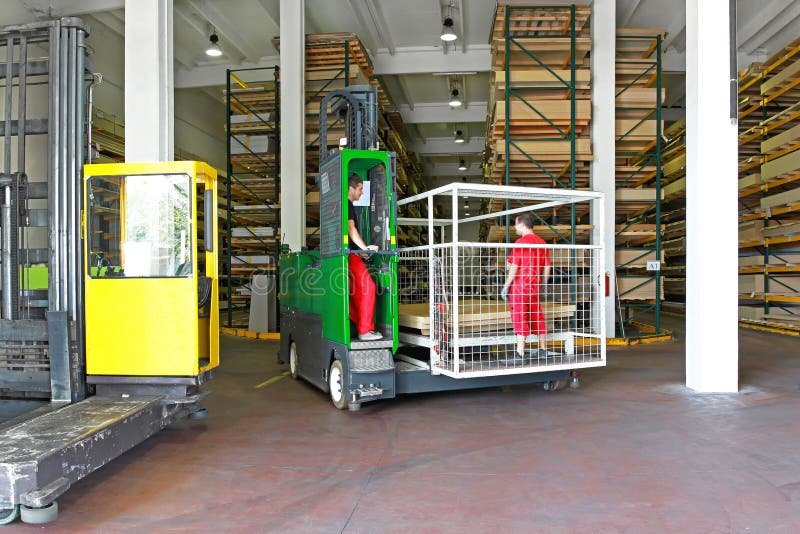 Side loader forklifts stock photo. Image of supplies - 29482722