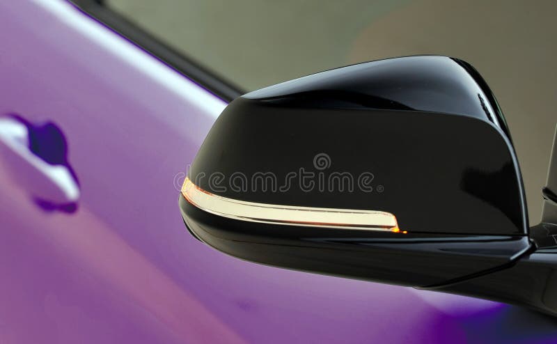 Side Mirror with Turn Signal of a Luxury Car Stock Photo - Image of ...