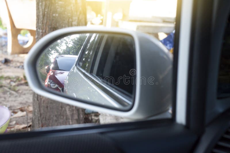 Side mirror of white car. stock image. Image of colorful - 131885441