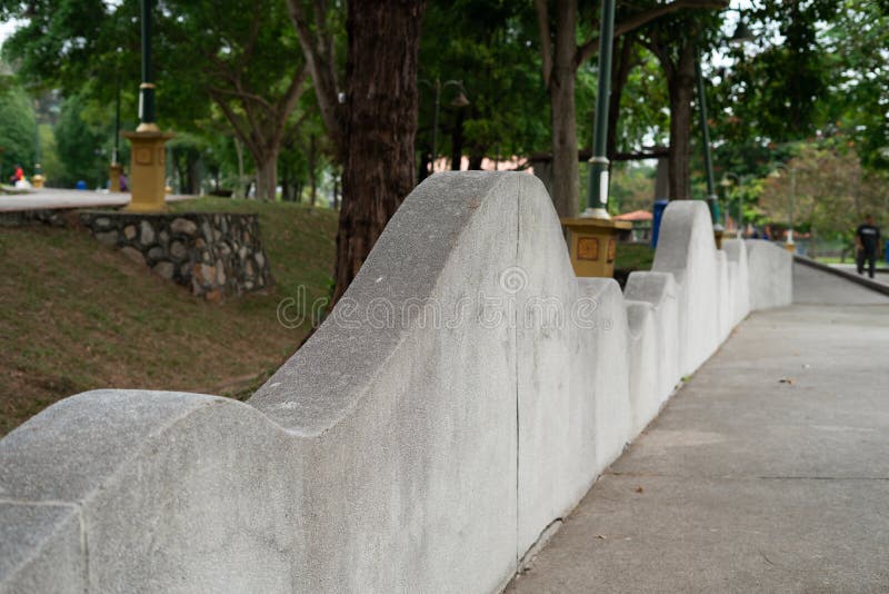 Side Perspective on a Modern Design Concrete Fence Style in the Park ...