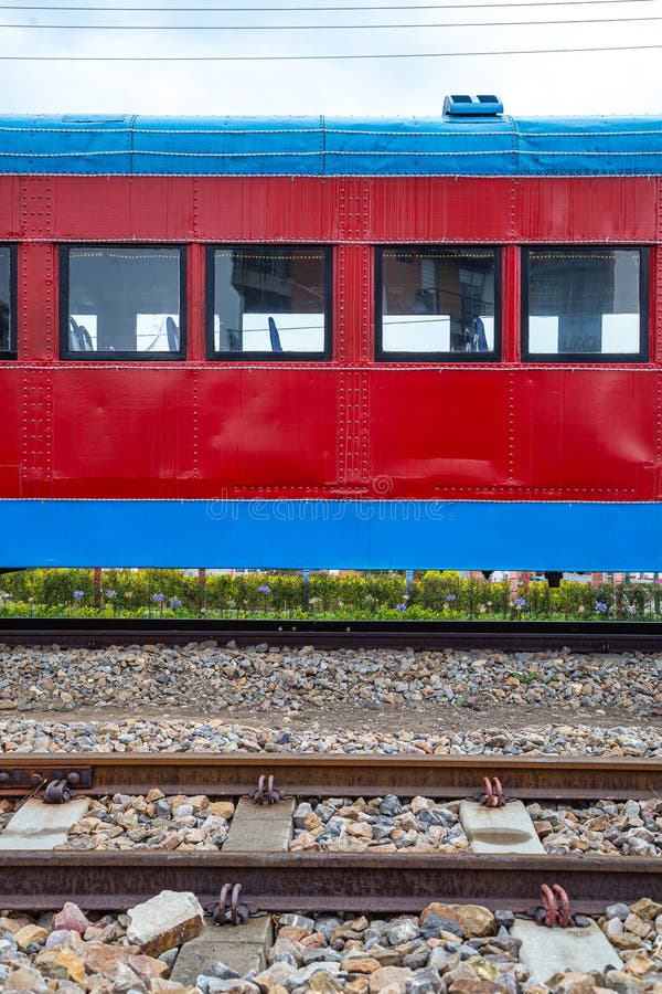 Side Photograph of an Old Colored Train on the Railroad Stock Image ...