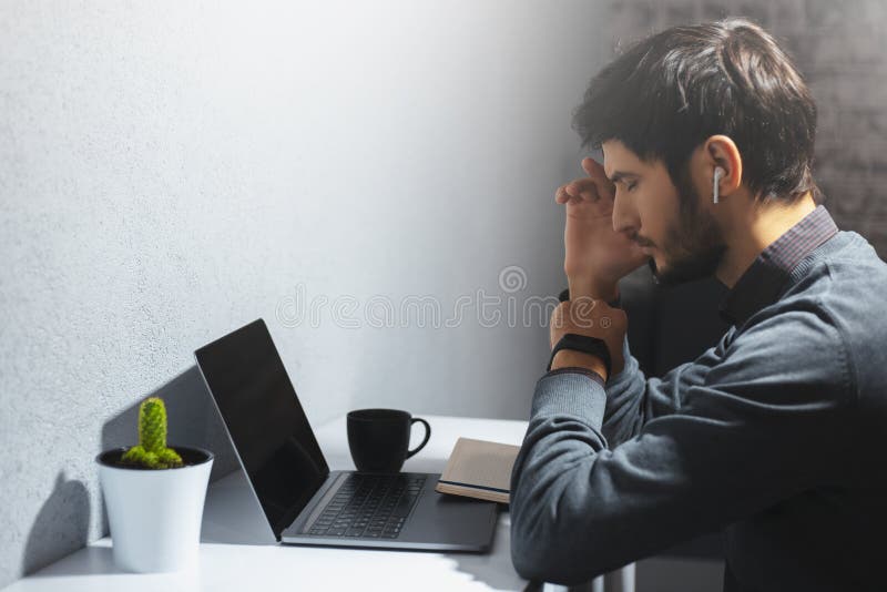 Side Portrait of Young Thoughtful Man with Closed Eyes Working Online ...