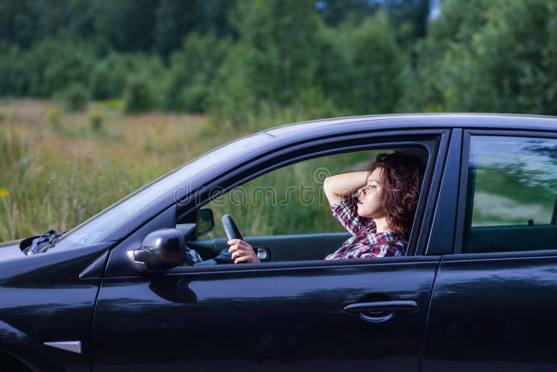 Side Portrait of Young Woman Driving a Car Stock Image - Image of motor ...