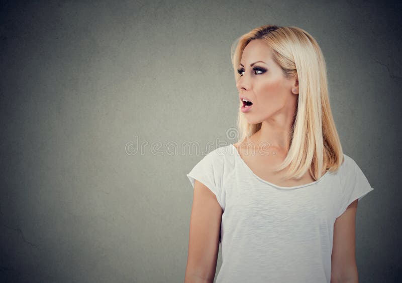 Side Profile of a Blonde Young Woman Talking Stock Photo - Image of ...