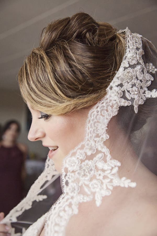 Profile of Bride Holding Bouquet Stock Photo - Image of wedding, roses ...