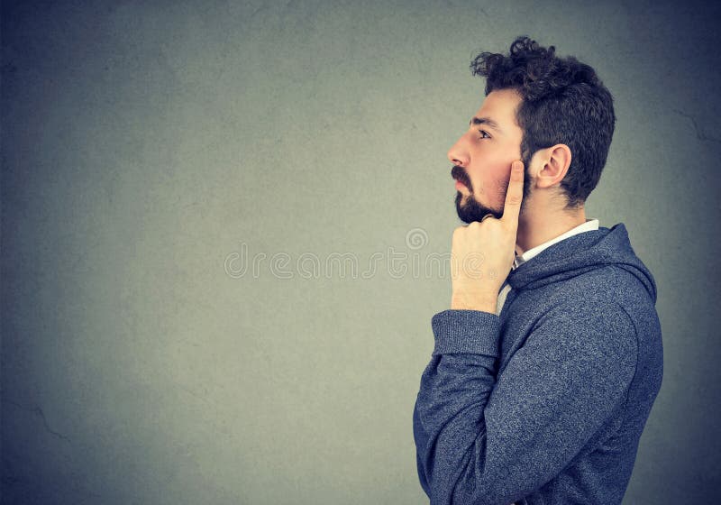 Side Profile of a Man Standing Thinking about Question with Pensive ...