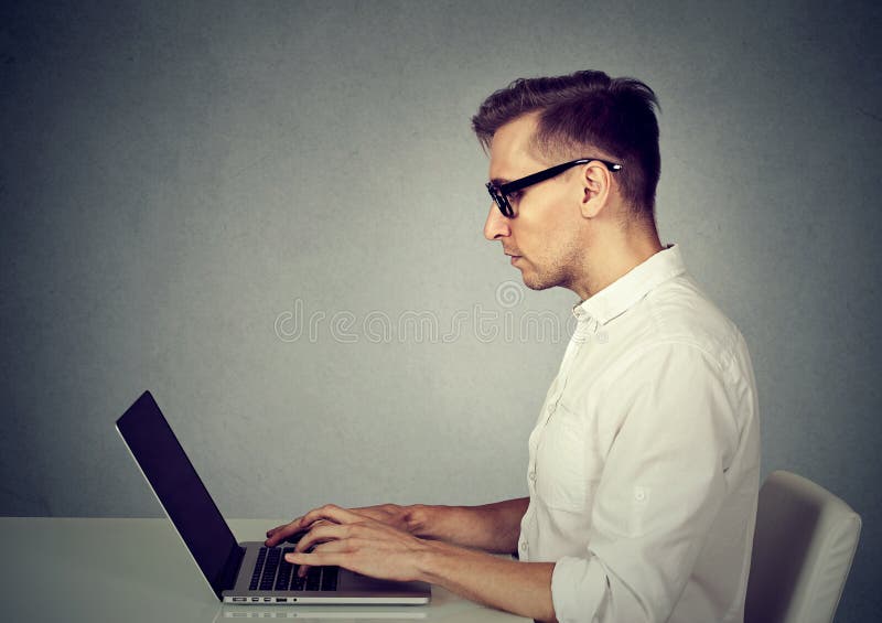 Side Profile Man Using a Laptop Computer Stock Photo - Image of ...