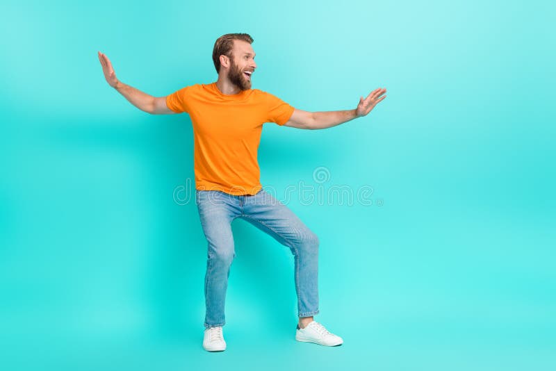 Side Profile Photo Of Handsome Positive Man Muscular Beard Wear Orange