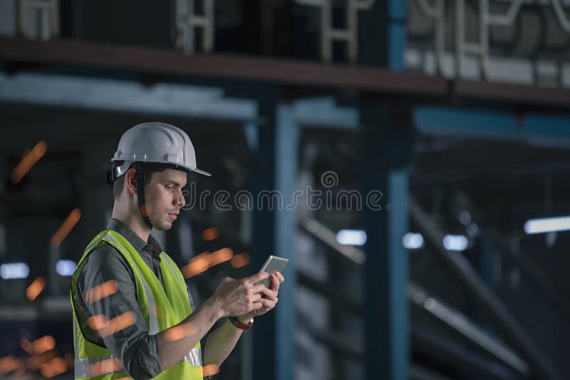 Side Profile of a Technical Engineer Working on the Digital Tablet in ...