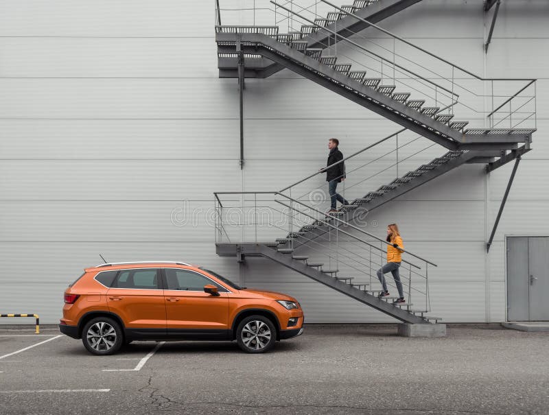 Samoa Orange SEAT Ateca Crossover in Front of Grey Wall Editorial Stock ...