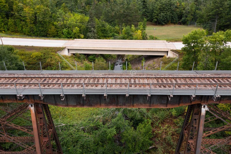Side by Side Railroad Trestle and Bridge Stock Image - Image of summer ...