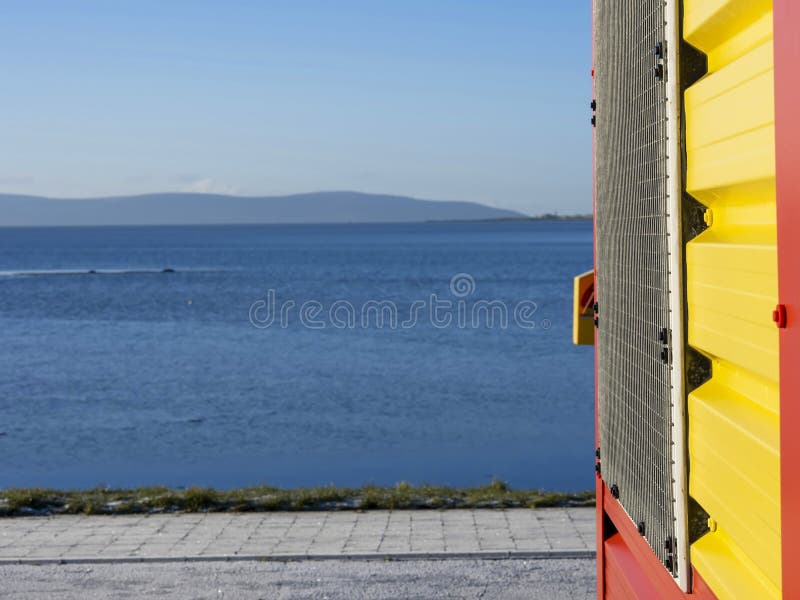Side of a Safe Guard House and Blue Ocean with Mountains in the ...
