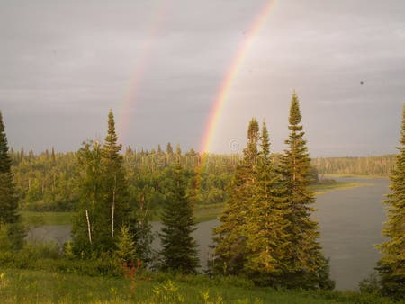 Side by side rainbows stock image. Image of rainbows, lake - 964743
