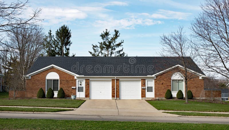 Row of Brick Condos with Bay Windows Stock Photo - Image of expensive ...