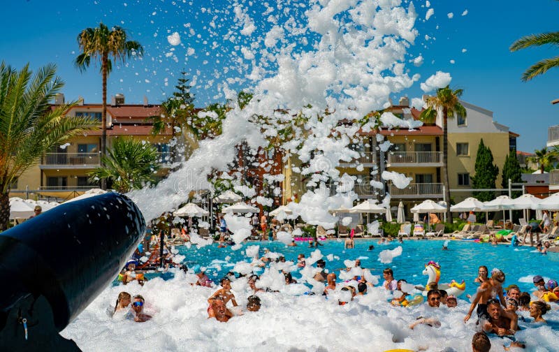 Foam party in the pool. editorial photography. Image of flying - 341744492