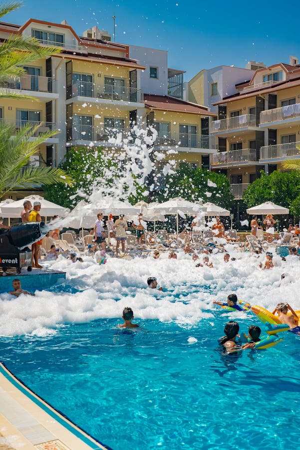 Foam party in the pool. editorial image. Image of emotion - 341744500