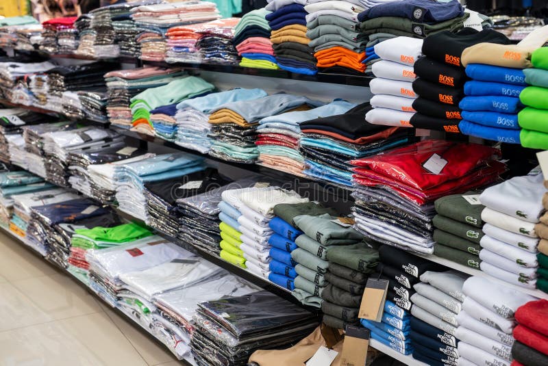 Various T-shirts in the Store. Editorial Stock Photo - Image of tshirt ...
