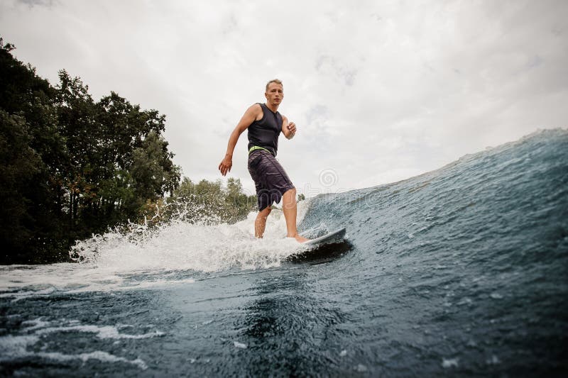 Side View Active Boy Standing on the White Wakeboard Stock Image ...