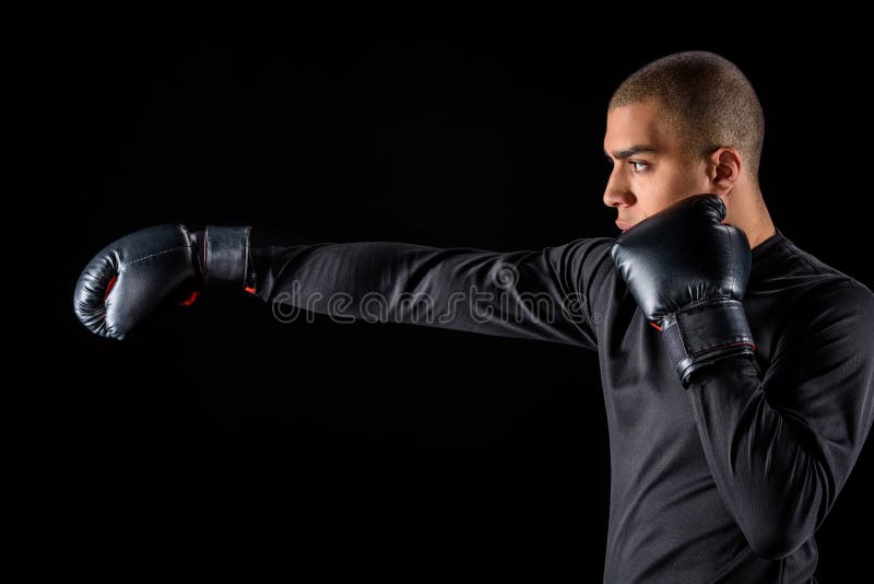 Side View of African American Boxer Making Hit Stock Photo - Image of ...