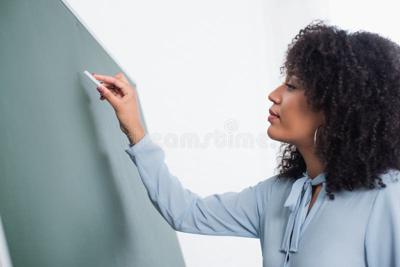 Side View of African American Teacher Stock Photo - Image of classroom ...