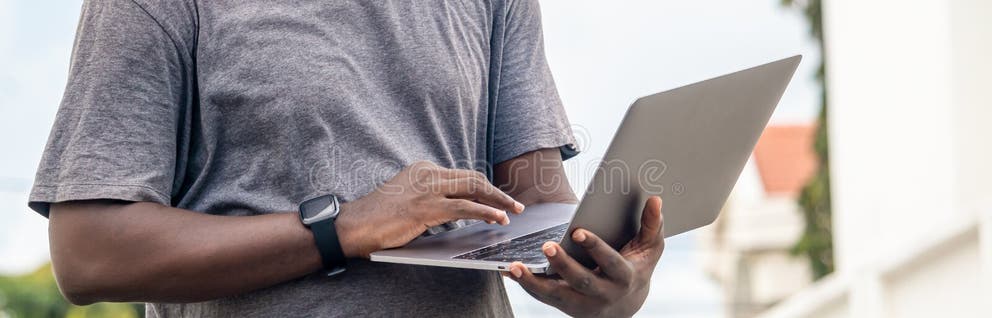Side View, African Web Developer Works with His Laptop Stock Image ...