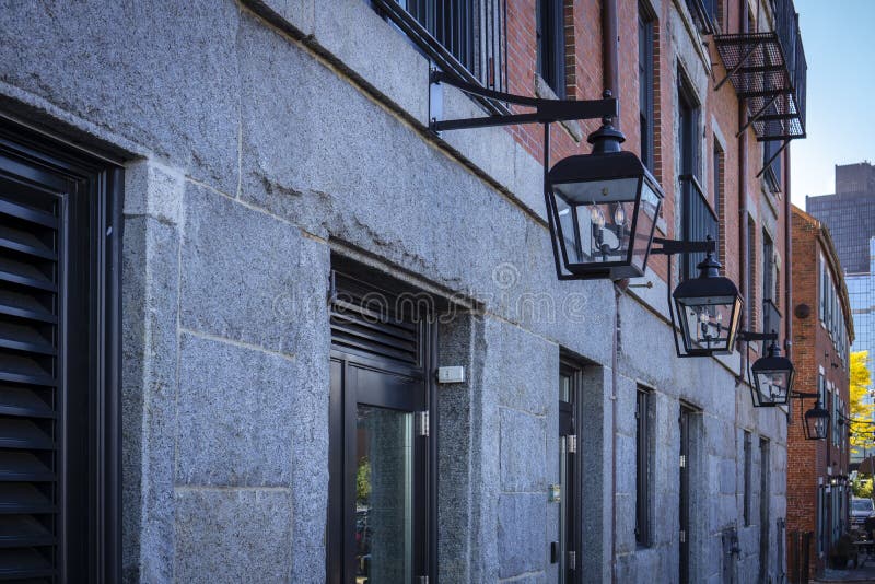 Side View of Apartment Building Facade with Hanging Lanterns. Stone and ...