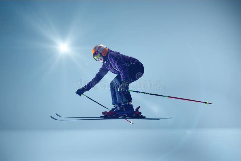 Side View of Athlete Executing Precise Ski Jump, Wearing Purple Jacket ...