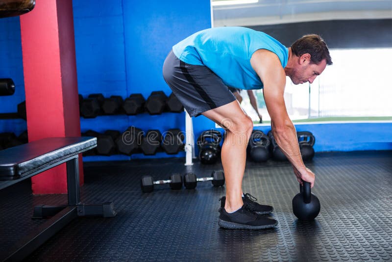 Side View of Athlete with Kettlebell in Gym Stock Photo - Image of ...