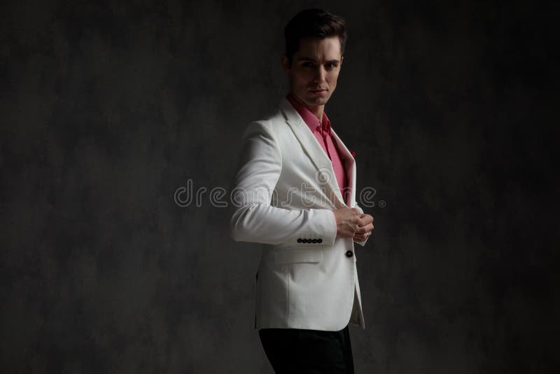 Side View of a Attractive Elegant Man Unbuttoning His Jacket Stock ...